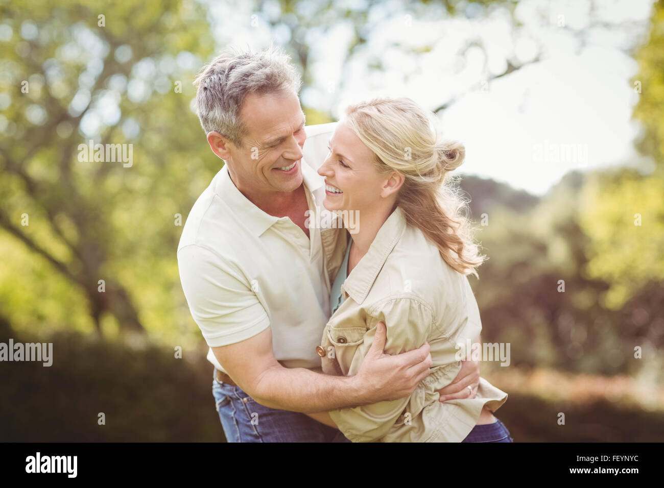 Cute couple hugging Stock Photo - Alamy