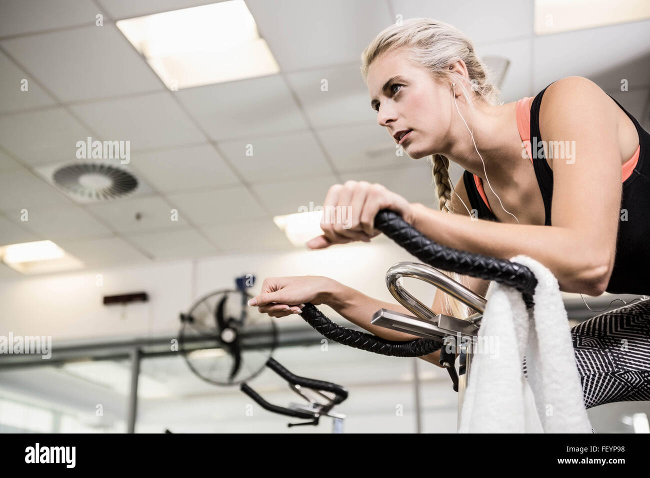 Woman and exercise bike hi-res stock photography and images - Alamy