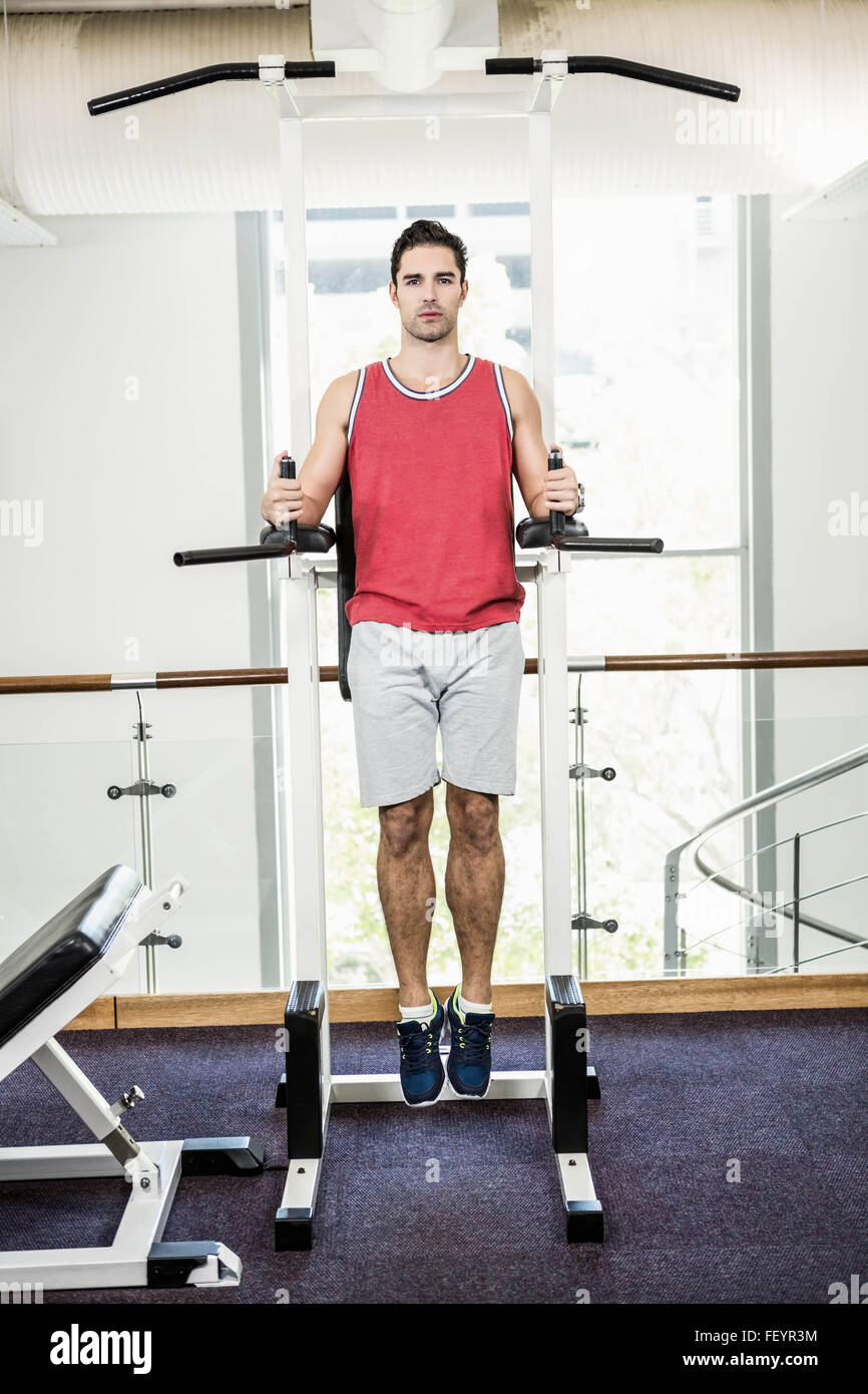 Muscular man doing pull up Stock Photo - Alamy