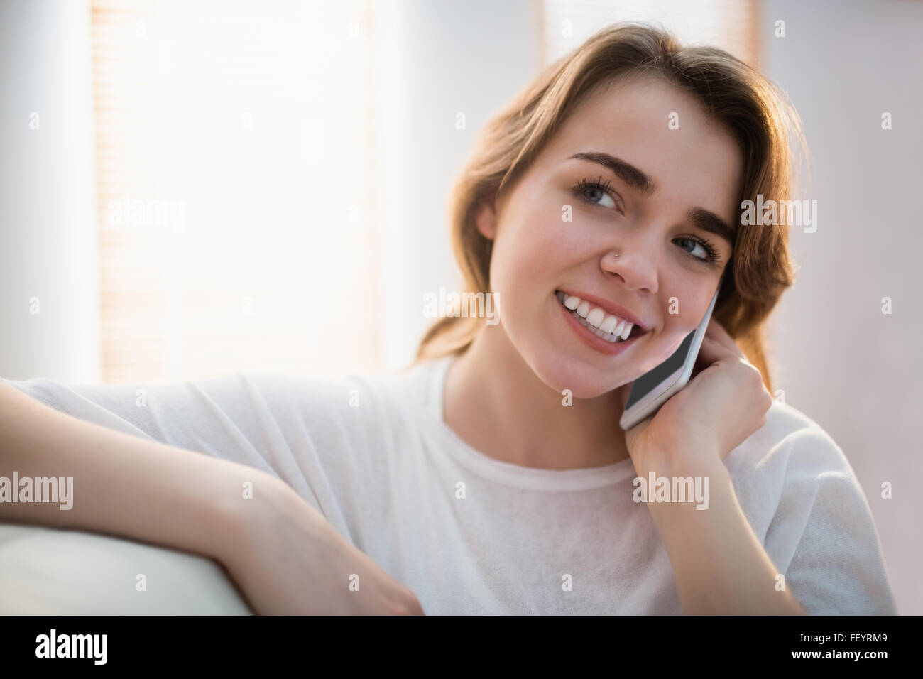 Pretty woman calling on the phone Stock Photo - Alamy