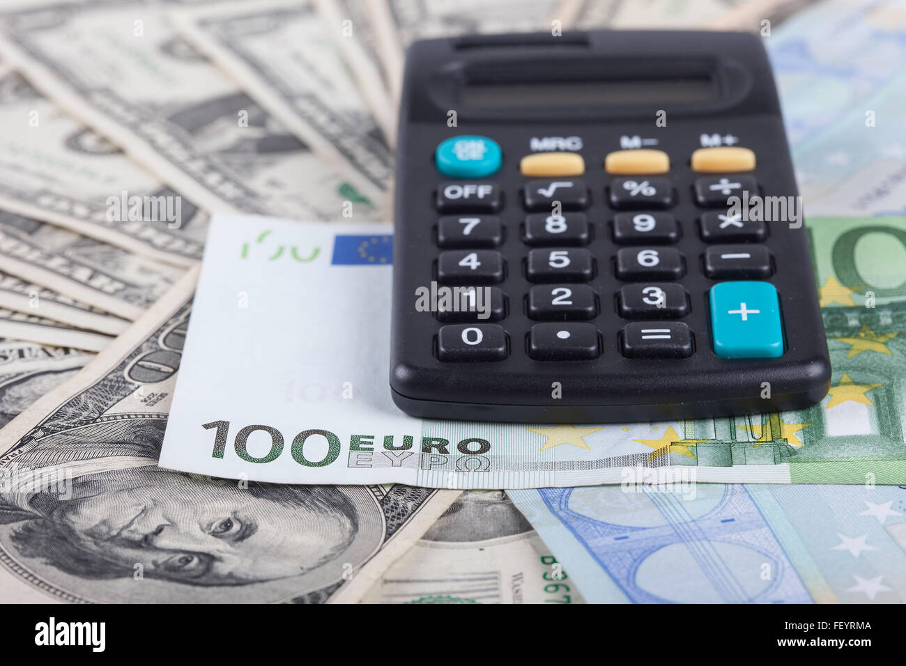 calculator, banknotes of dollars and euro background Stock Photo - Alamy