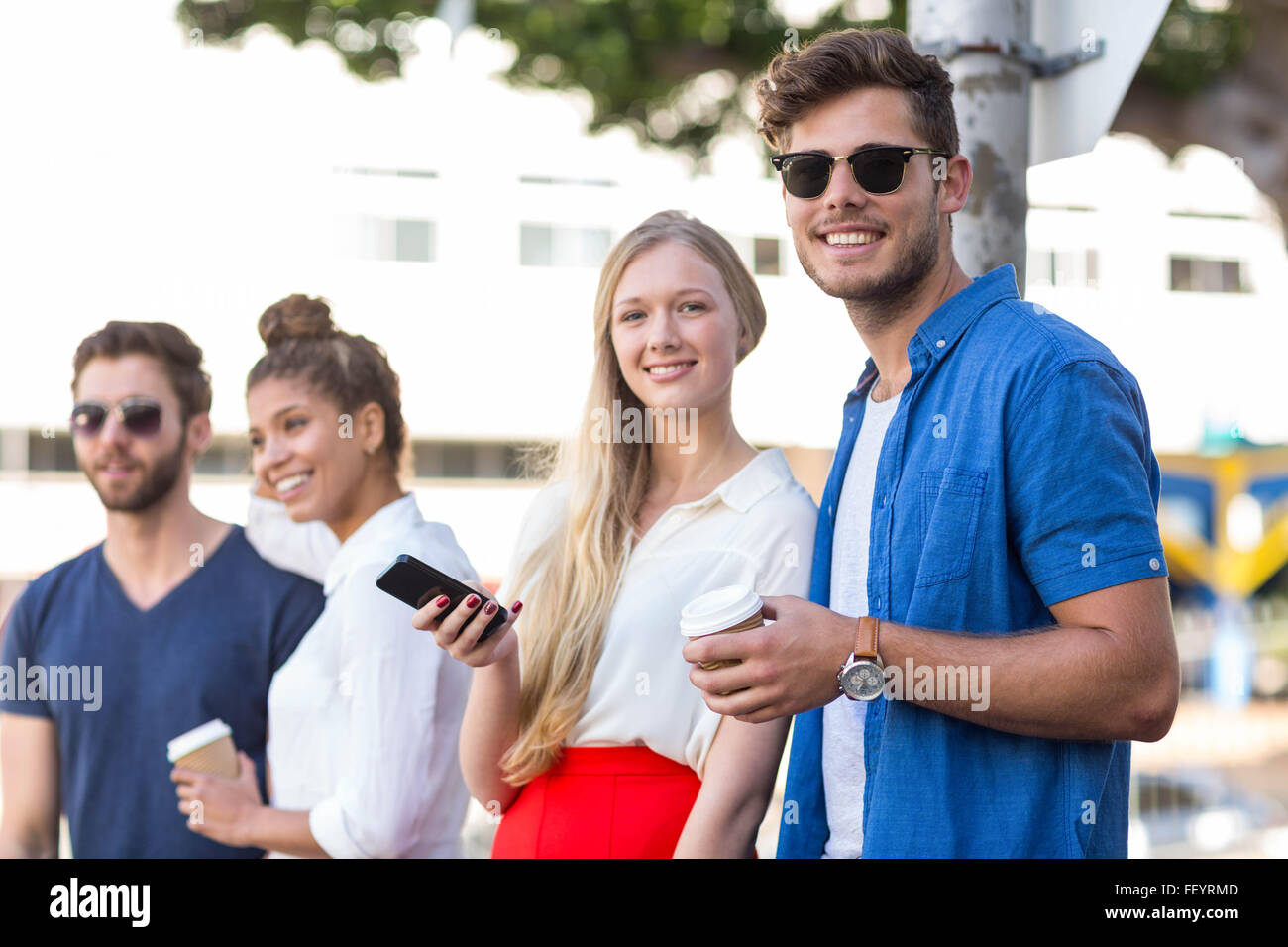Smiling friends man woman showing hi-res stock photography and images ...