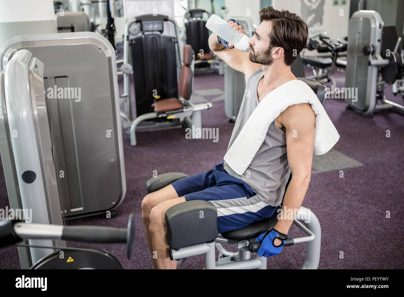 Handsome man drinking water Stock Photo - Alamy