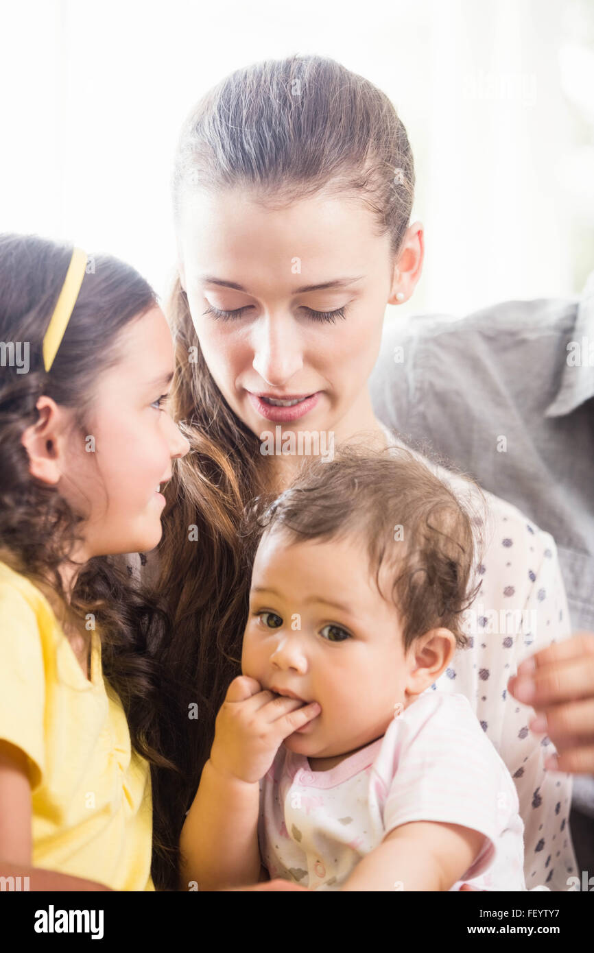 Happy extended family smiling Stock Photo - Alamy