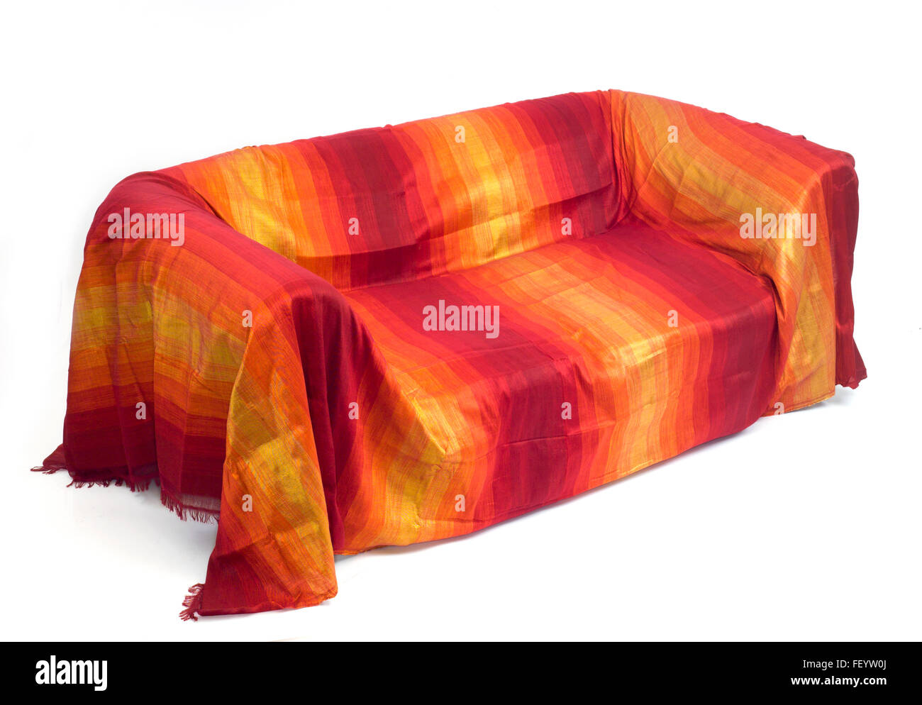 vibrant throw over a Sofa Stock Photo - Alamy