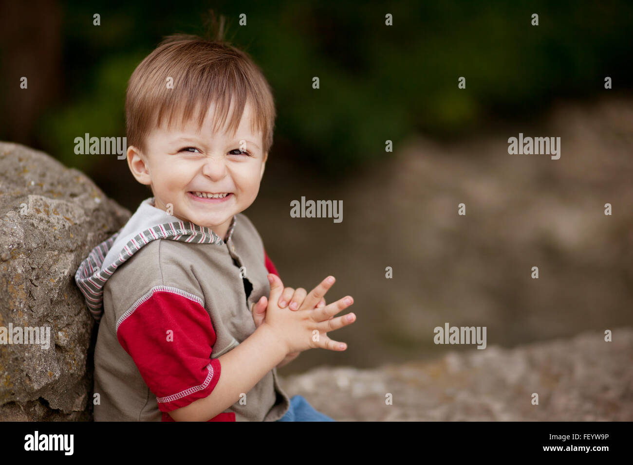 Smiling shy boy Stock Photo - Alamy