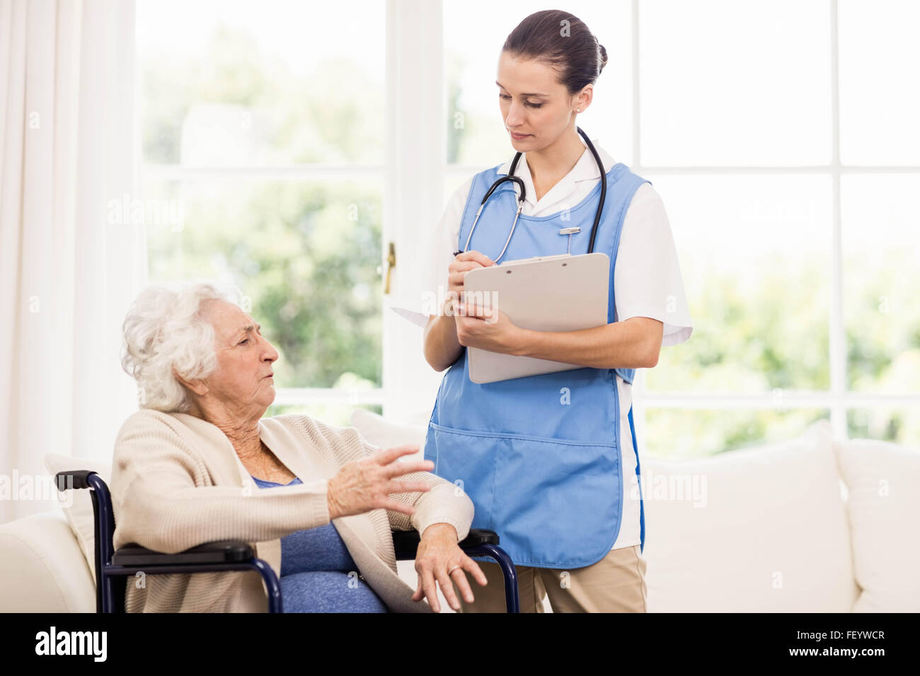Doctor checking hi-res stock photography and images - Alamy