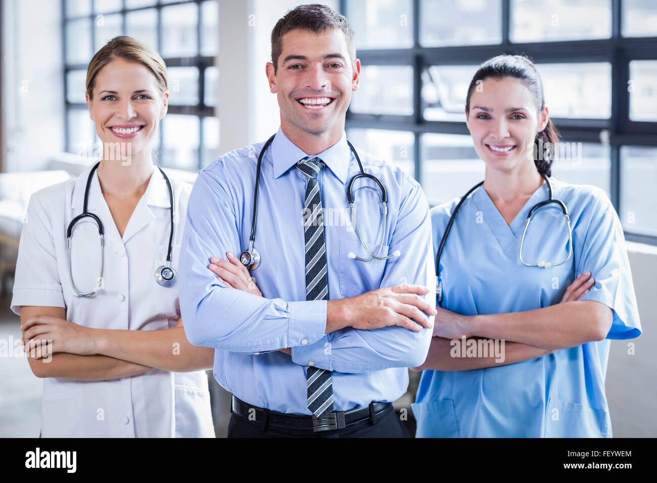 Team smiling together hi-res stock photography and images - Alamy