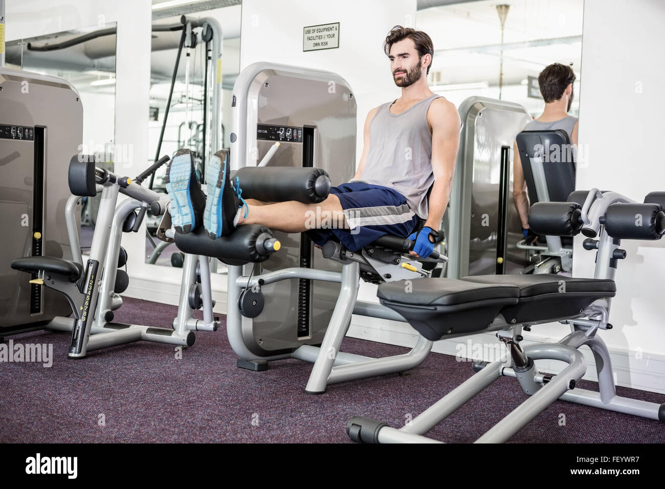 Man lifting legs gym hi-res stock photography and images - Alamy