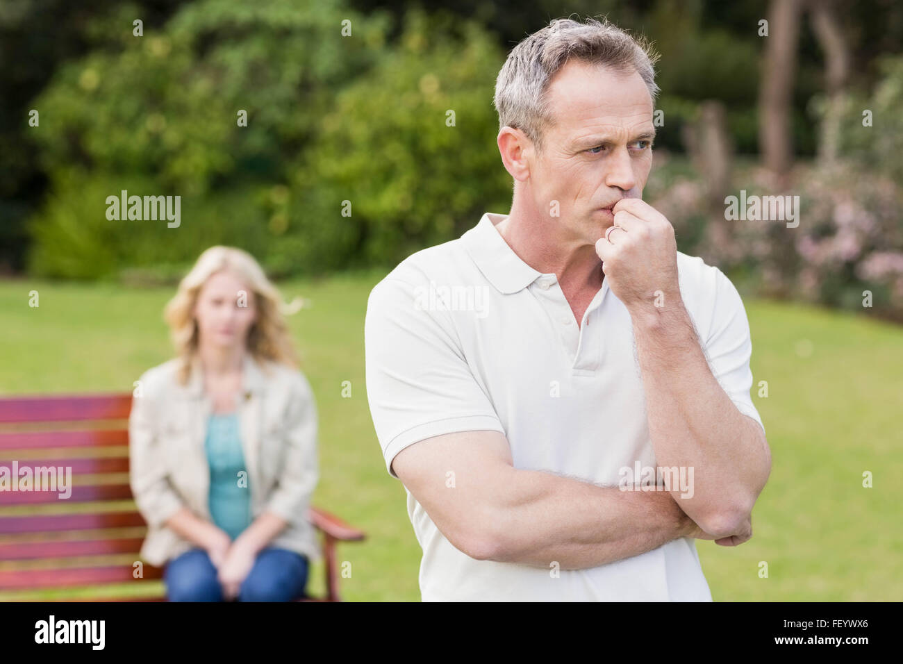 Man sitting behind woman hi-res stock photography and images - Alamy