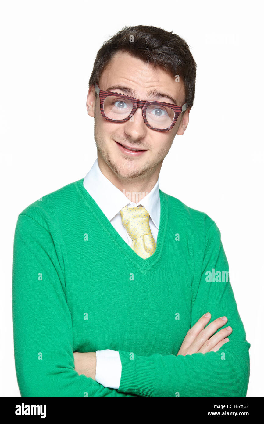 Funny young nerd man with big eyeglasses playing games and winning ...