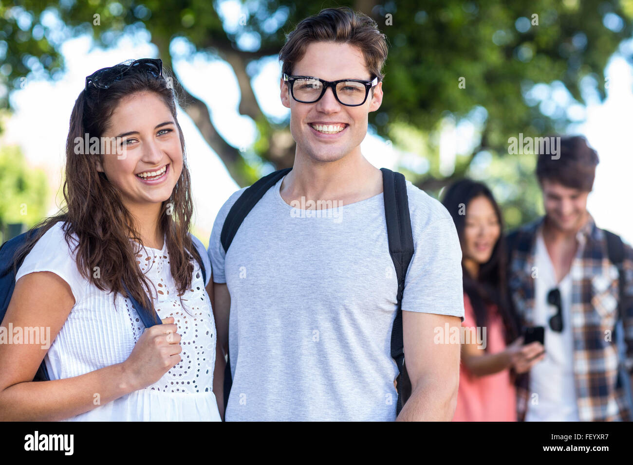 Hip couple posing for camera Stock Photo - Alamy
