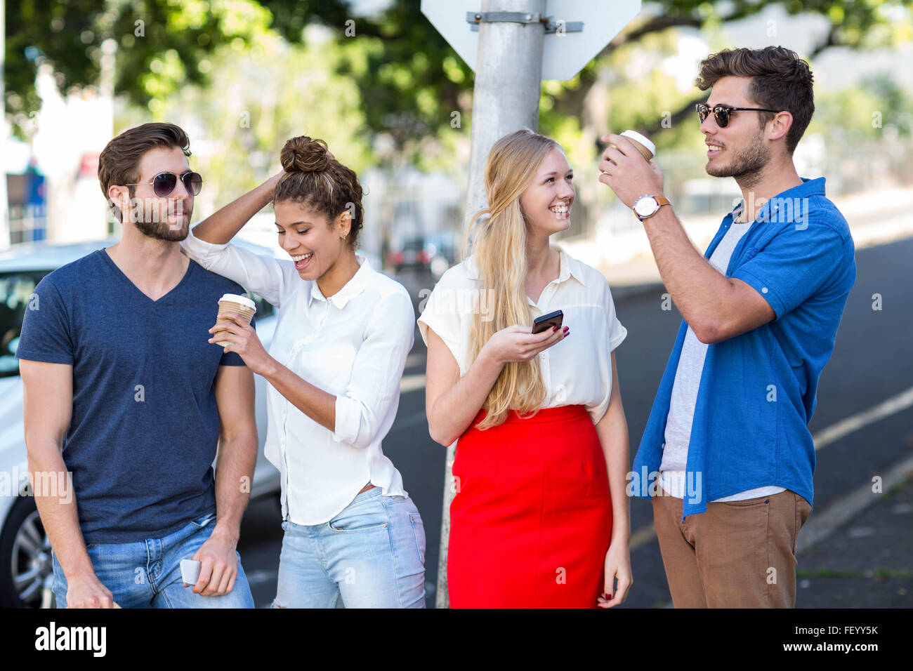 Hip friends spending time together Stock Photo - Alamy