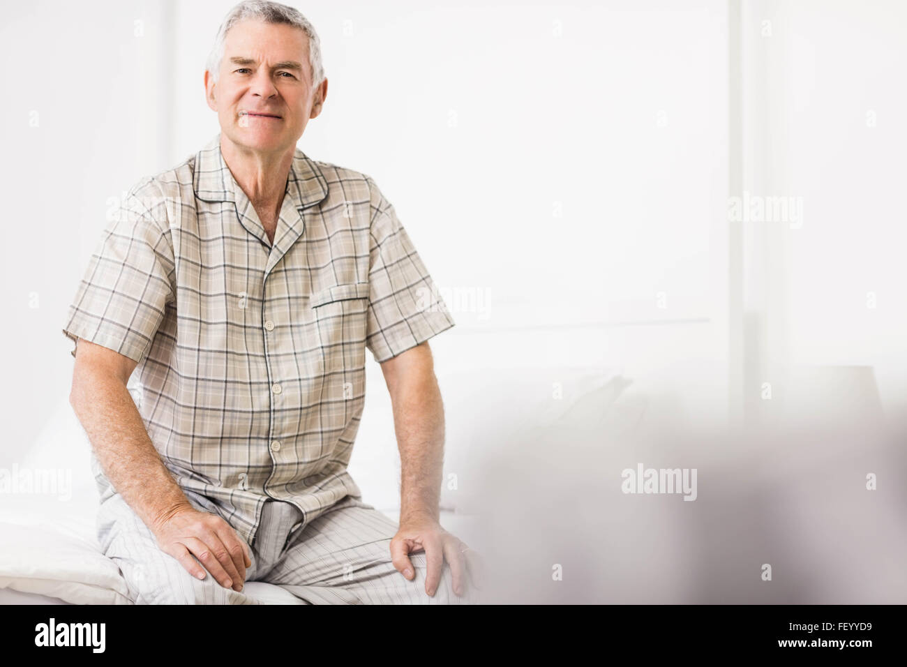 Peaceful senior man smiling Stock Photo - Alamy