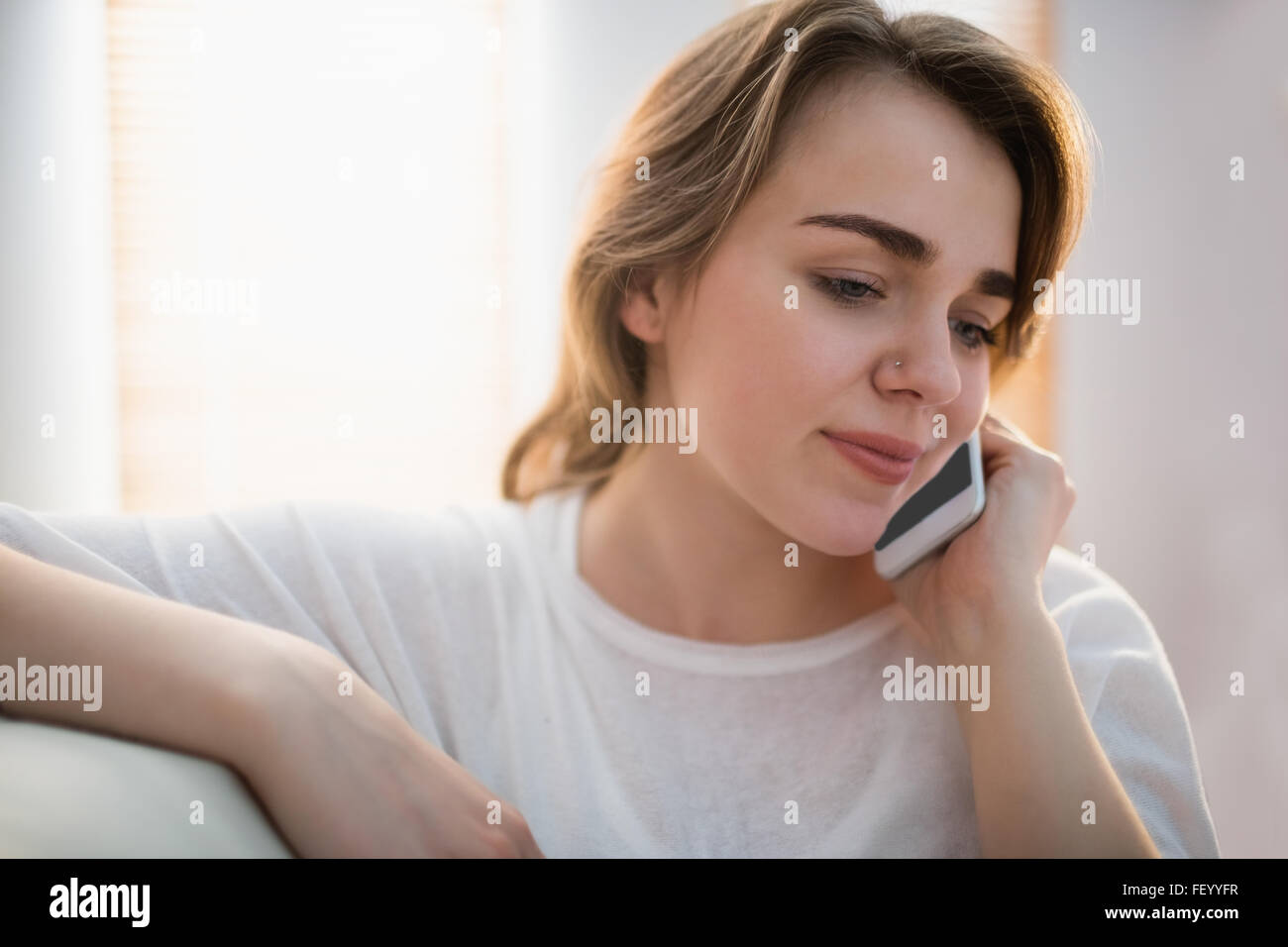 Pretty woman calling on the phone Stock Photo - Alamy