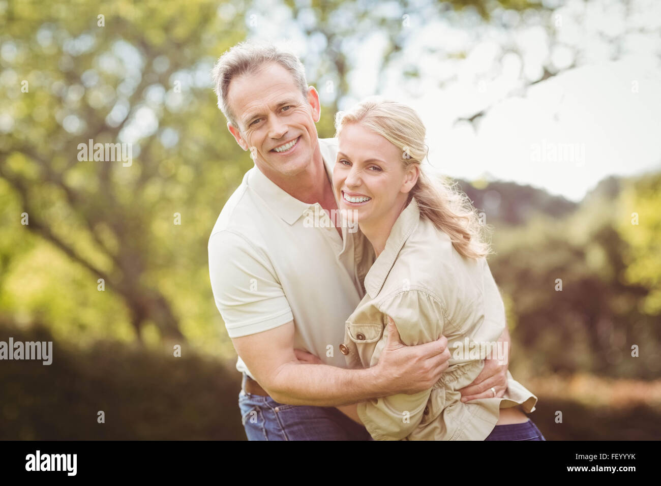 Cute couple hugging Stock Photo - Alamy