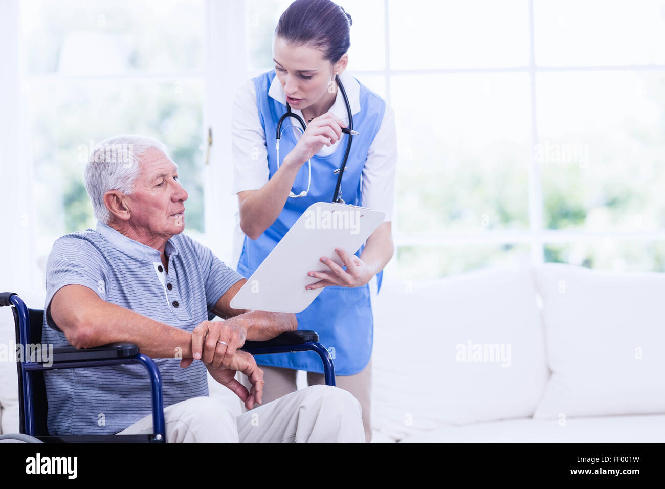 Doctor checking patients health Stock Photo - Alamy