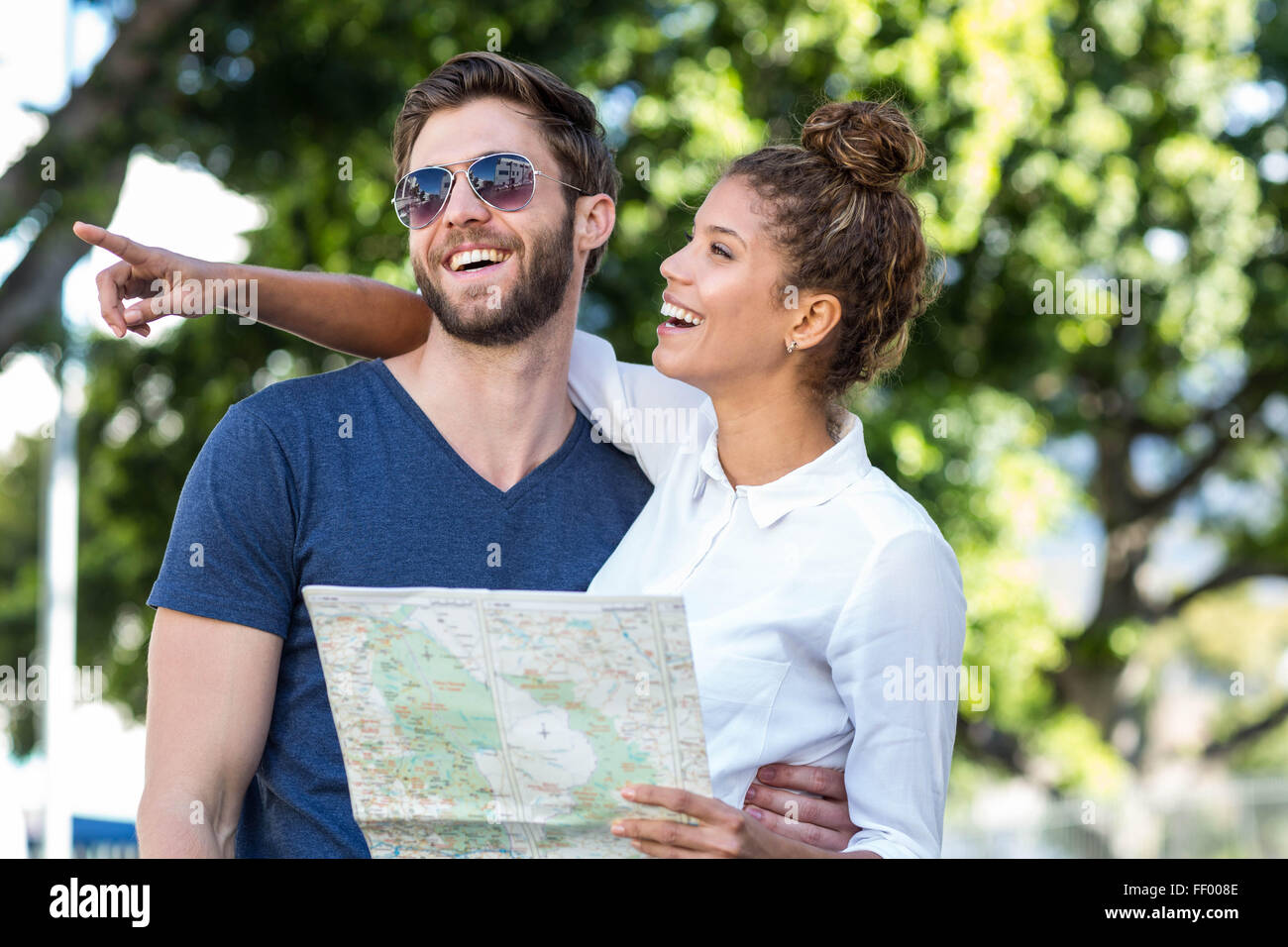 Female pointing at map hi-res stock photography and images - Alamy