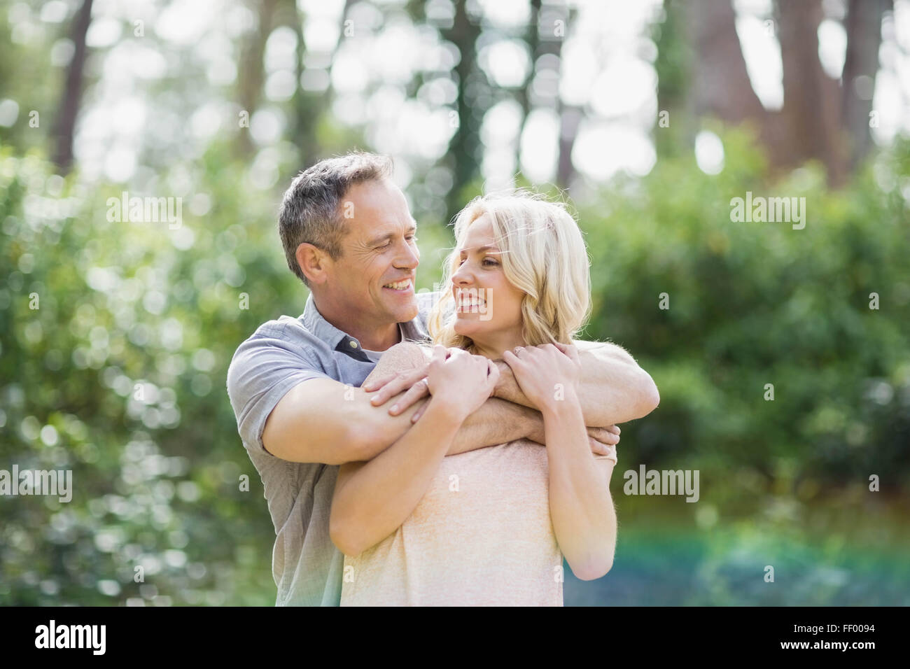 Cute couple hugging Stock Photo - Alamy