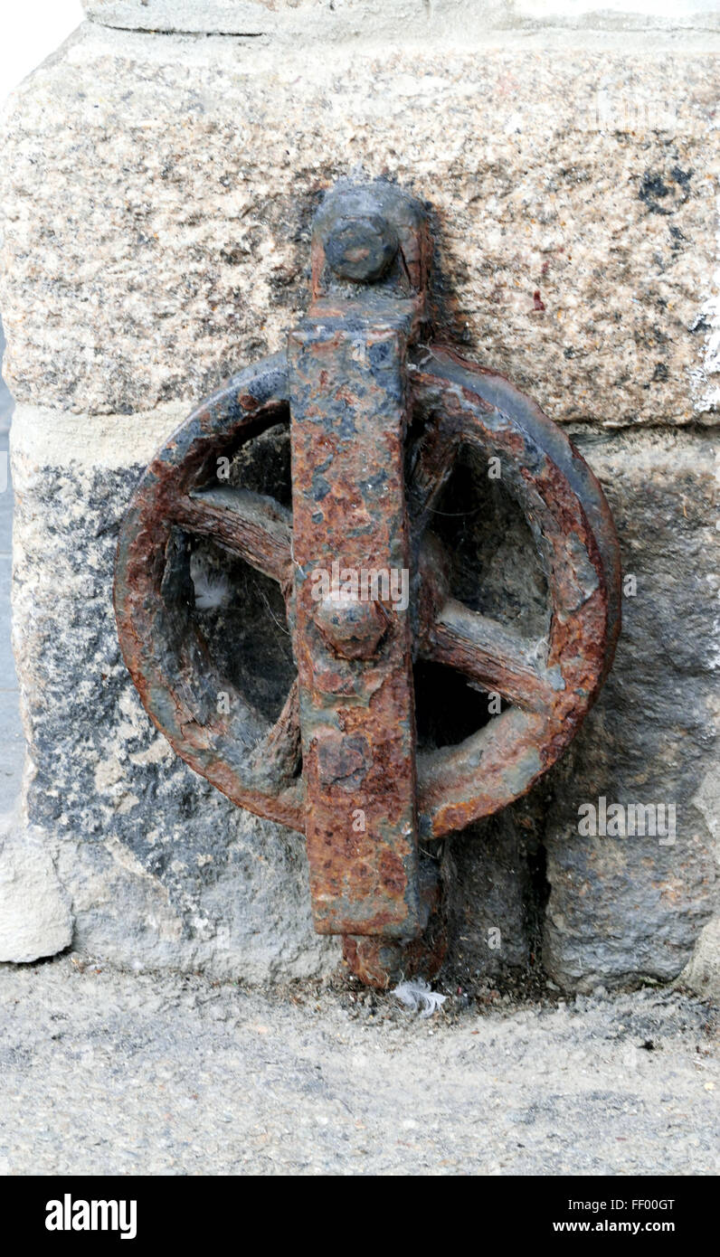 Old and rusted. Iron contraption used in the port of Looe, Cornwall ...