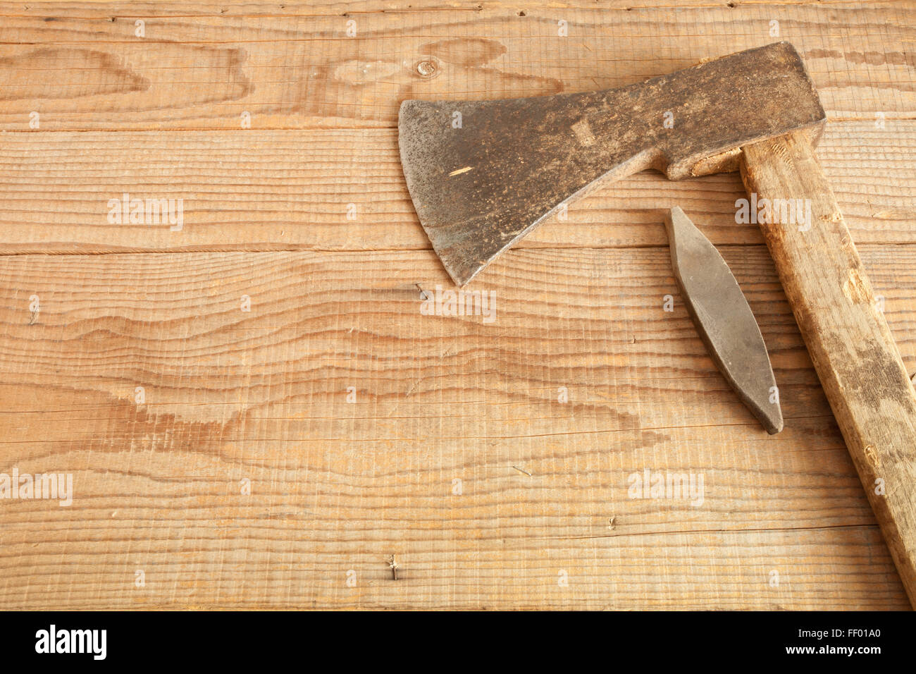 dated and used cleaver on wooden background Stock Photo - Alamy