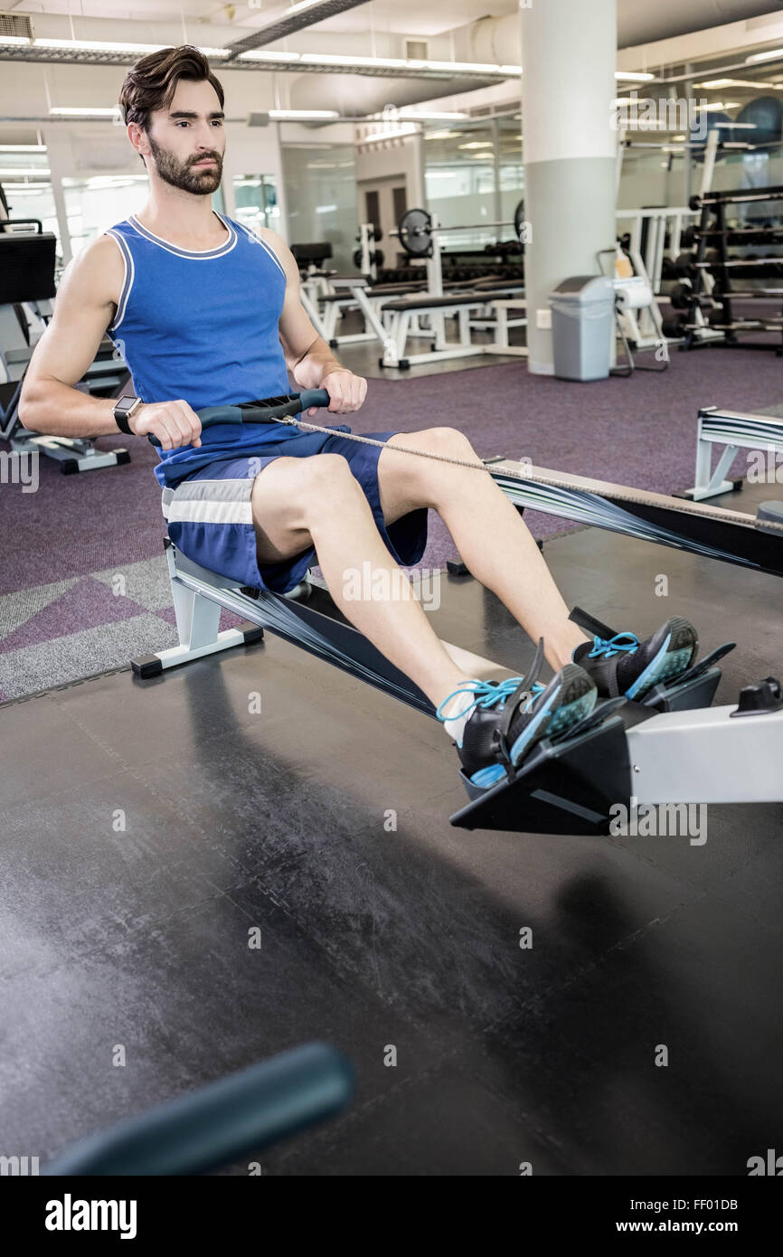 Man on rower machine hi-res stock photography and images - Alamy
