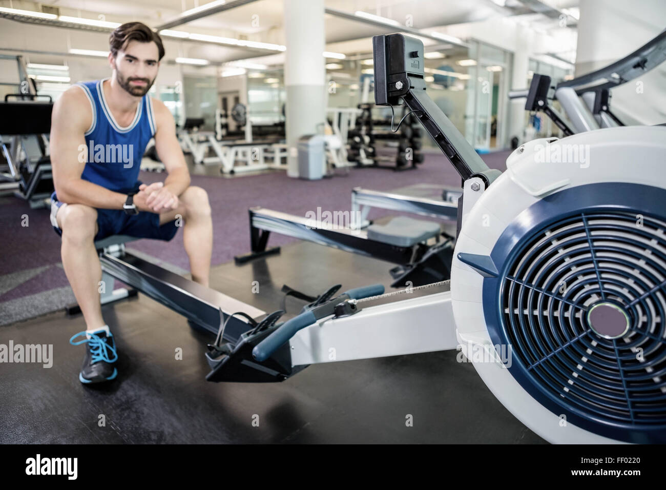 Man on rower machine hi-res stock photography and images - Alamy