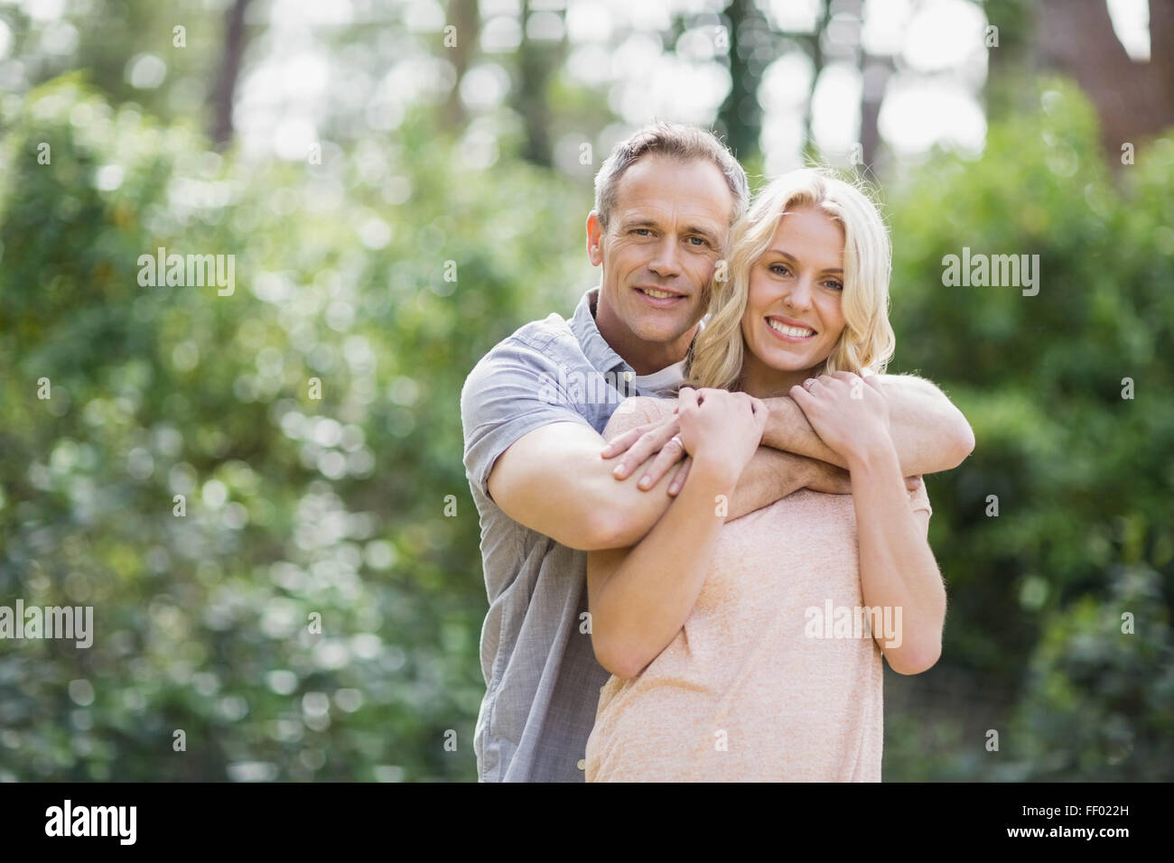 Cute couple hugging Stock Photo - Alamy