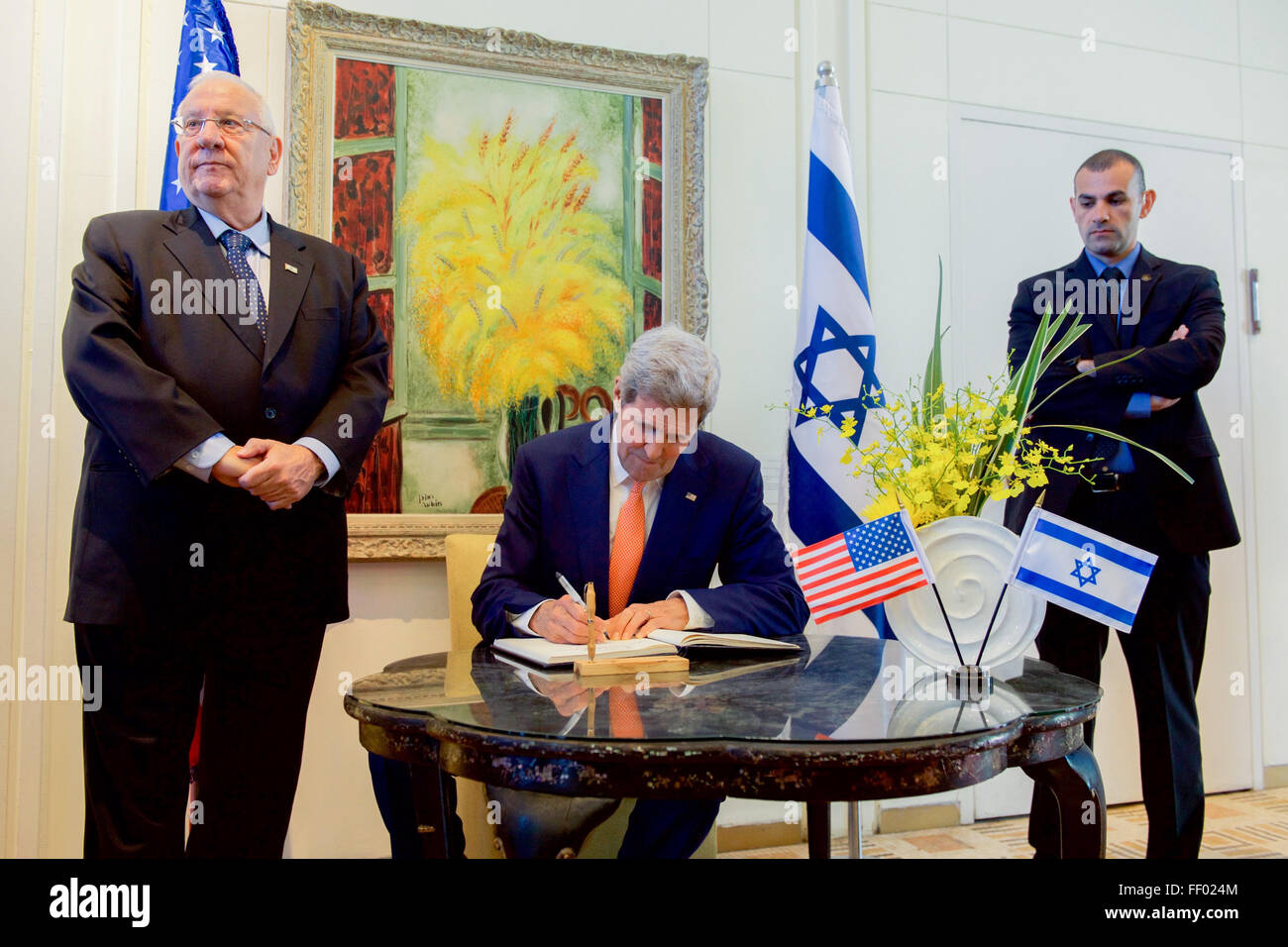 Secretary Kerry Signs a Guest Book at the President's Office in ...