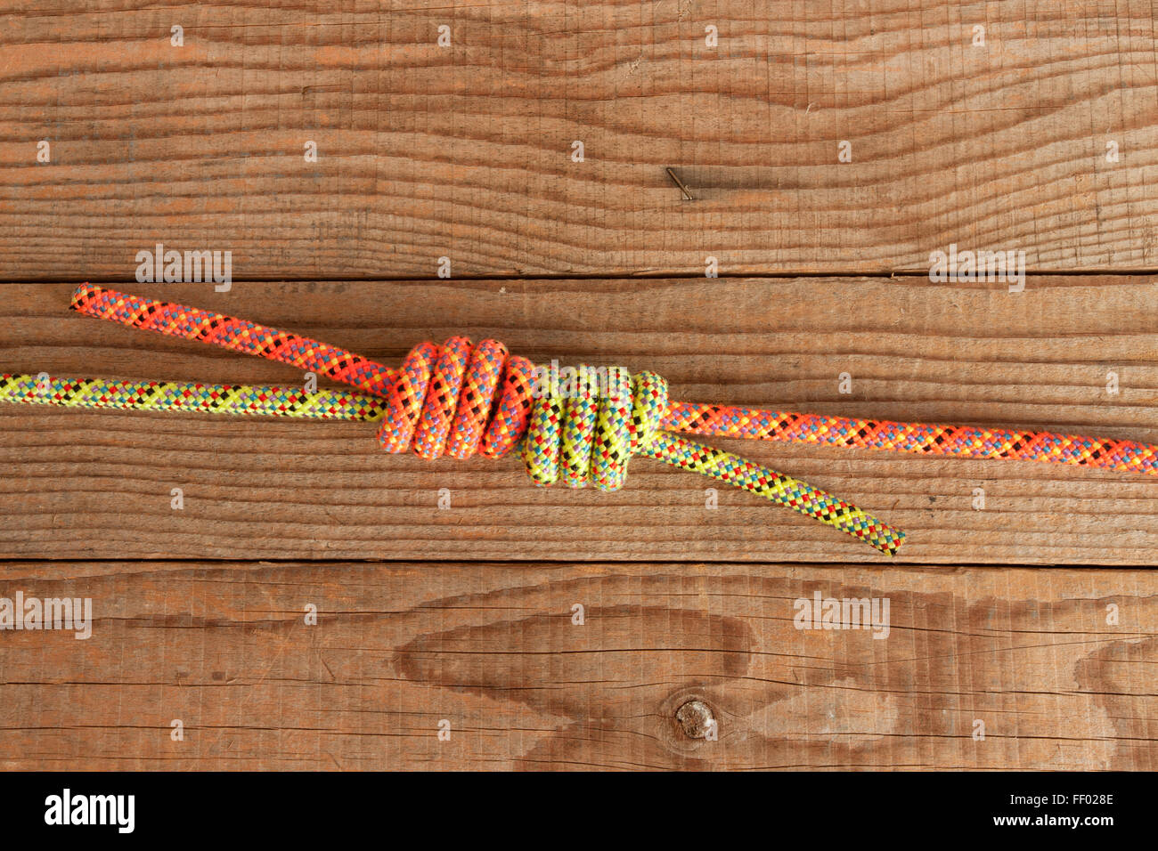 Junction between two mountain ropes on wooden background Stock Photo ...