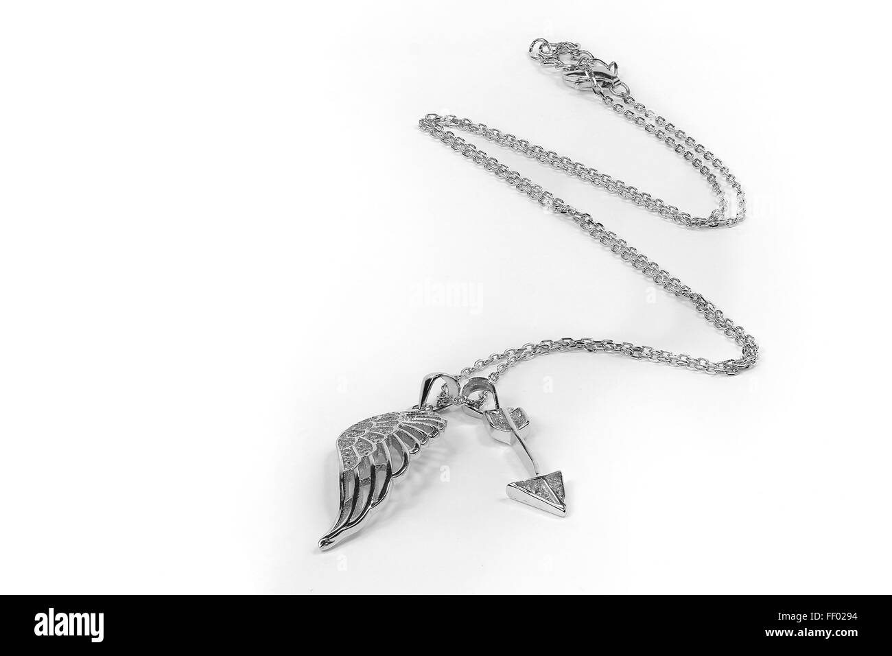 Gold white arrow on Black and White Stock Photos & Images - Alamy