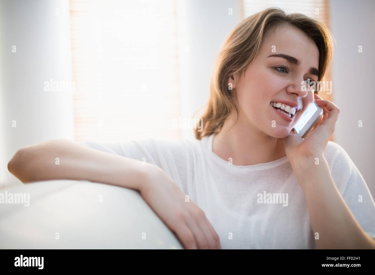 Pretty woman calling on the phone Stock Photo - Alamy