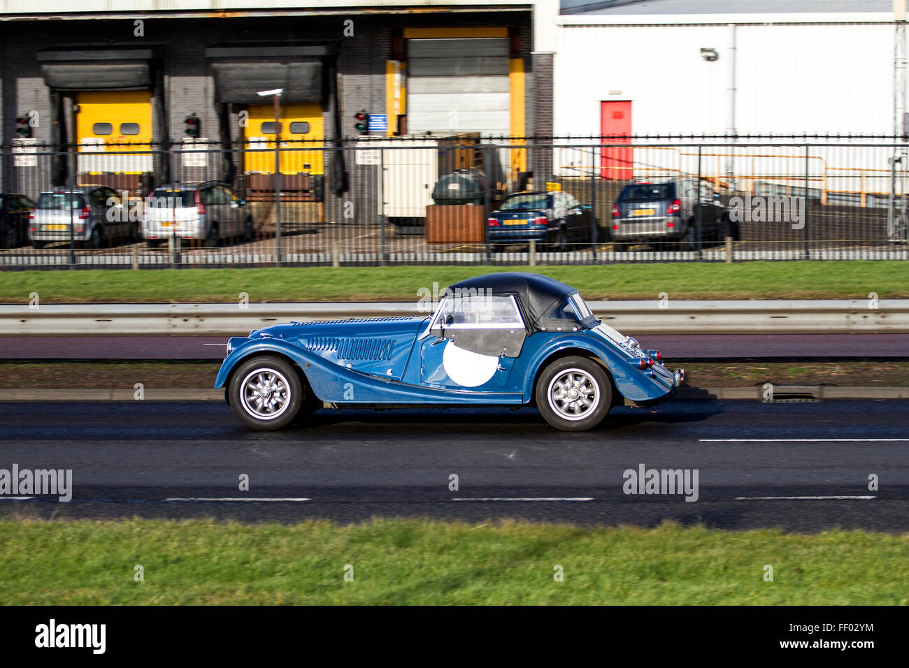 A Blue Morgan sports car travelling along the Kingsway West Dual ...