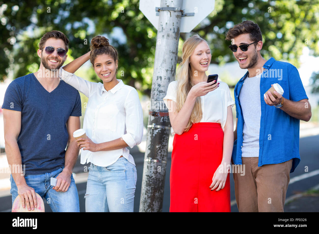 Hip friends spending time together Stock Photo - Alamy