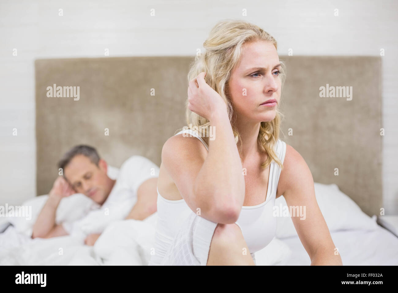 Upset couple sulking each other Stock Photo - Alamy