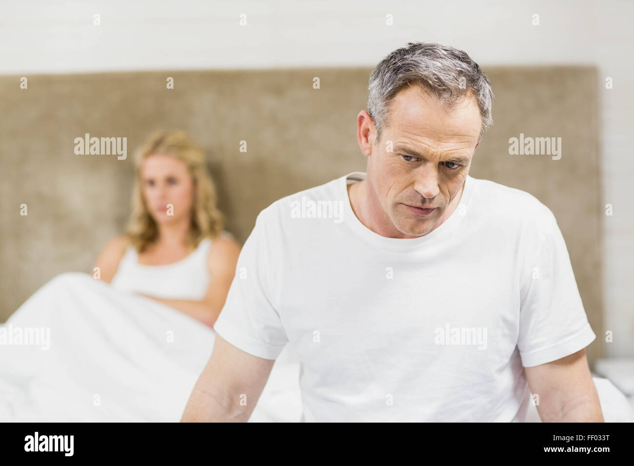 Upset couple sulking each other Stock Photo - Alamy