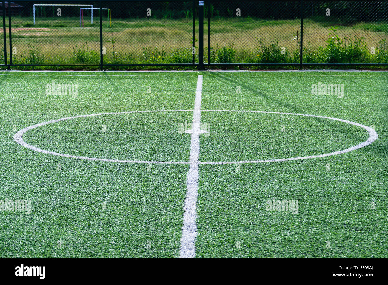 Artificial turf football field Stock Photo - Alamy
