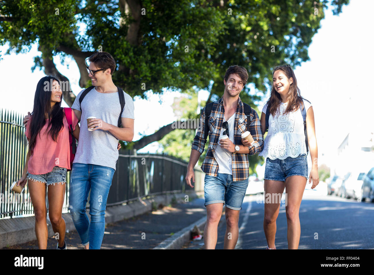 Friends talking outside hi-res stock photography and images - Alamy