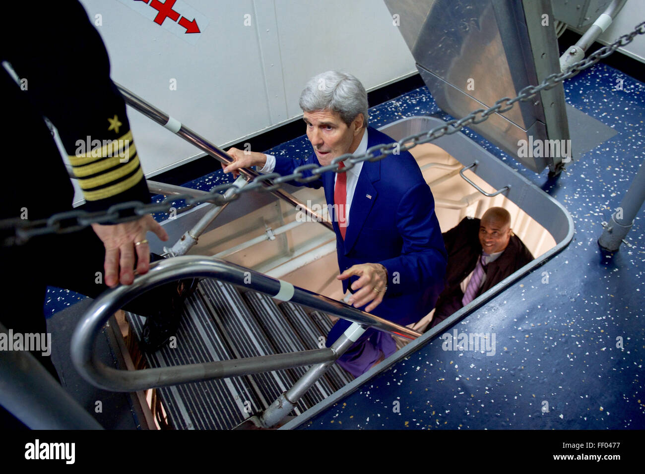 Secretary Kerry Climbs a Ladder in the USS San Antonio Stock Photo - Alamy