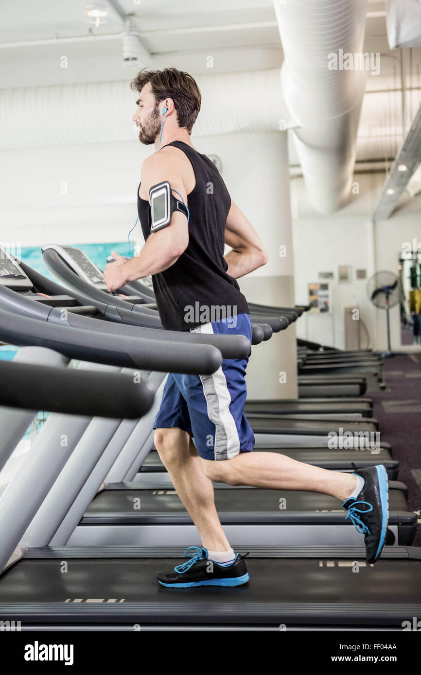 Man running on treadmill Stock Photo - Alamy