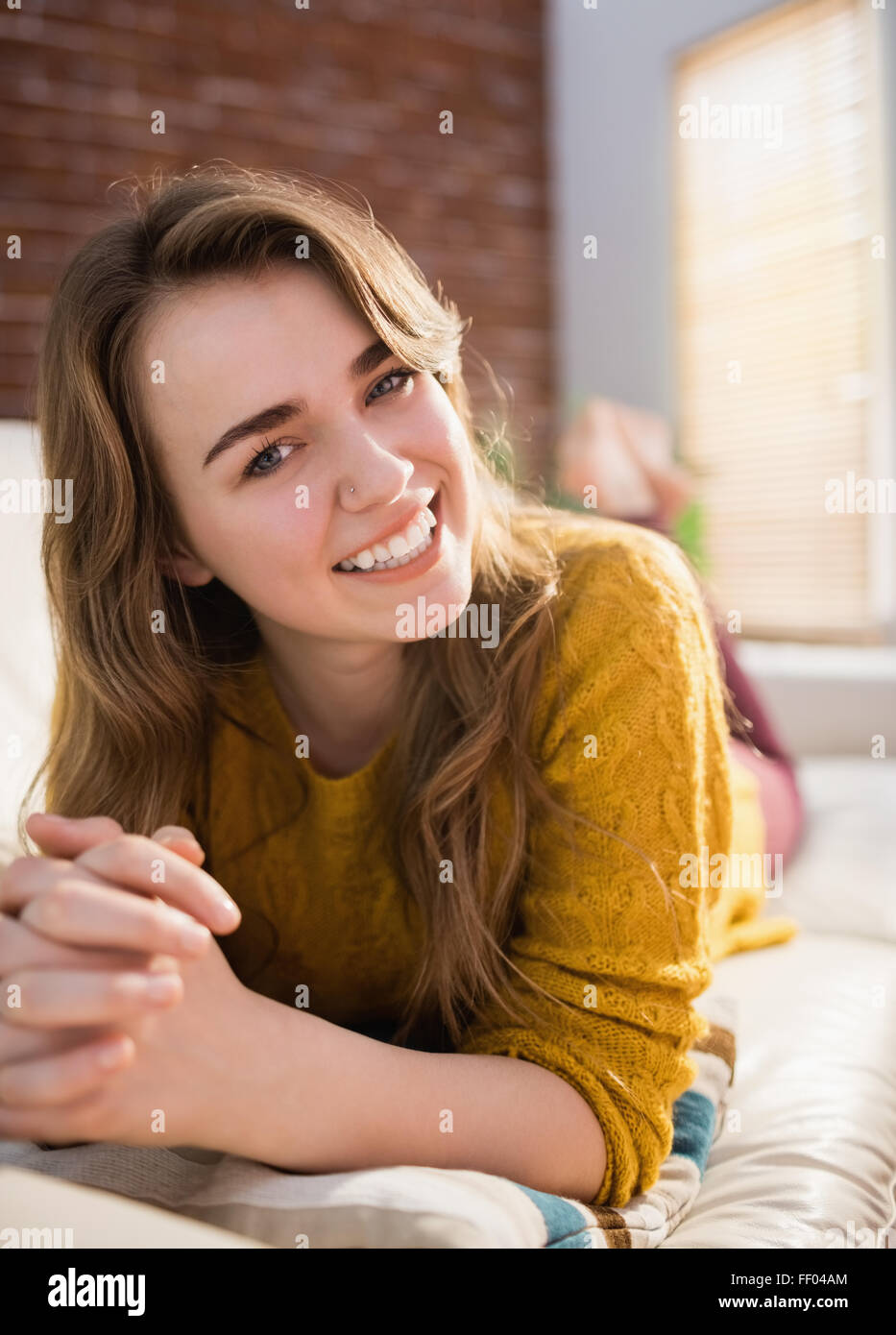 Pretty woman lying on hi-res stock photography and images - Alamy