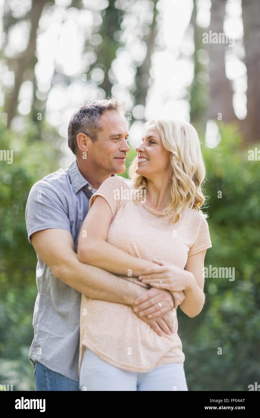 Cute couple hugging Stock Photo - Alamy