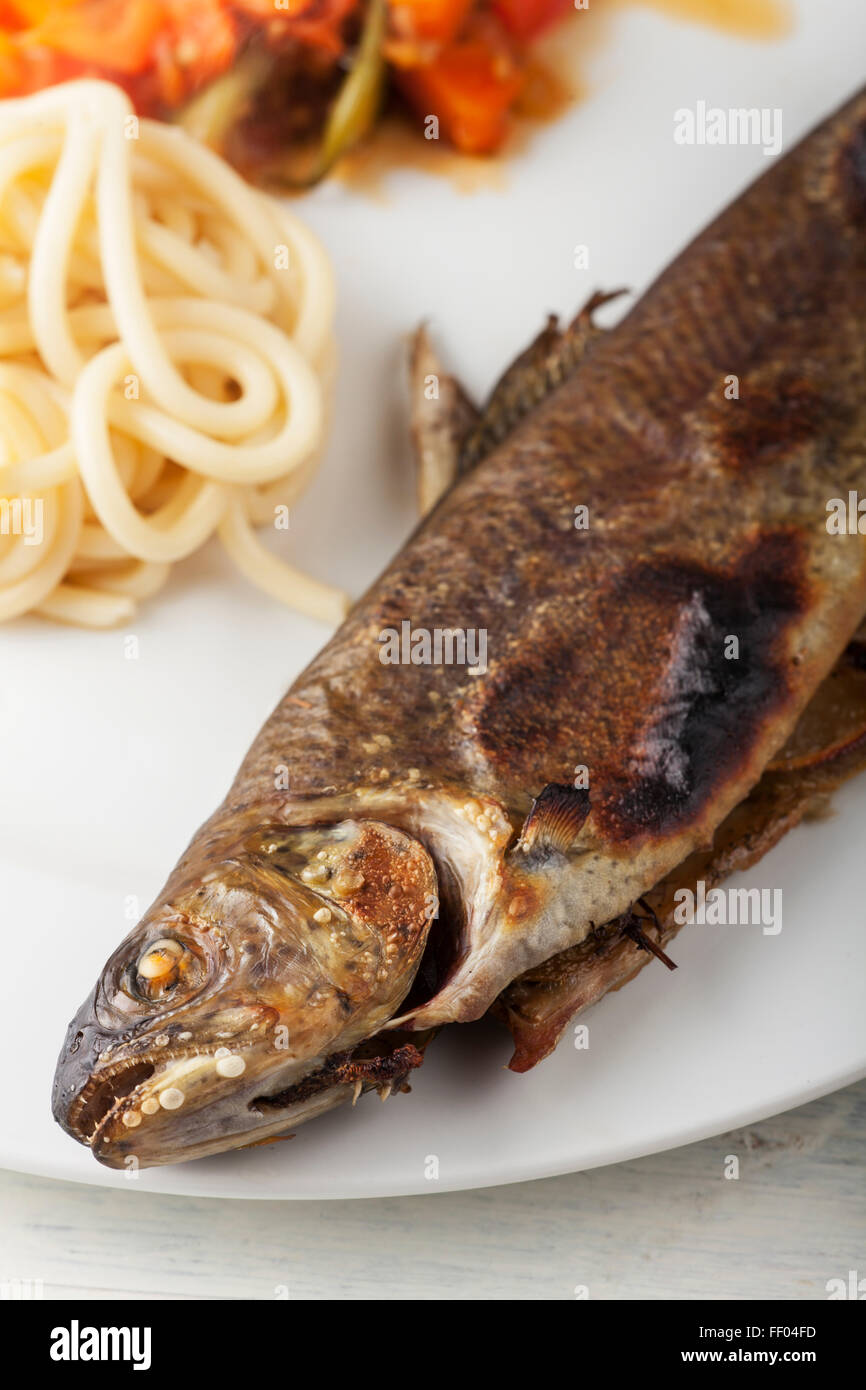 grilled trout with pasta Stock Photo - Alamy