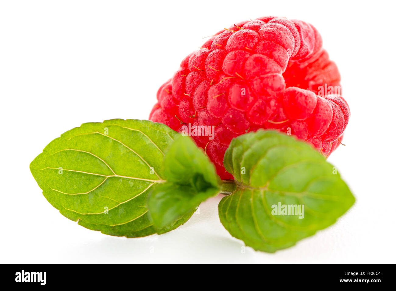 Raspberries with leaves isolated on white background Stock Photo - Alamy