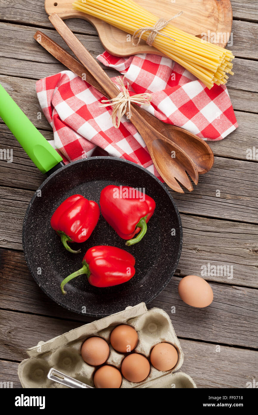 Cooking utensils and ingredients on wooden table. Top view Stock Photo ...