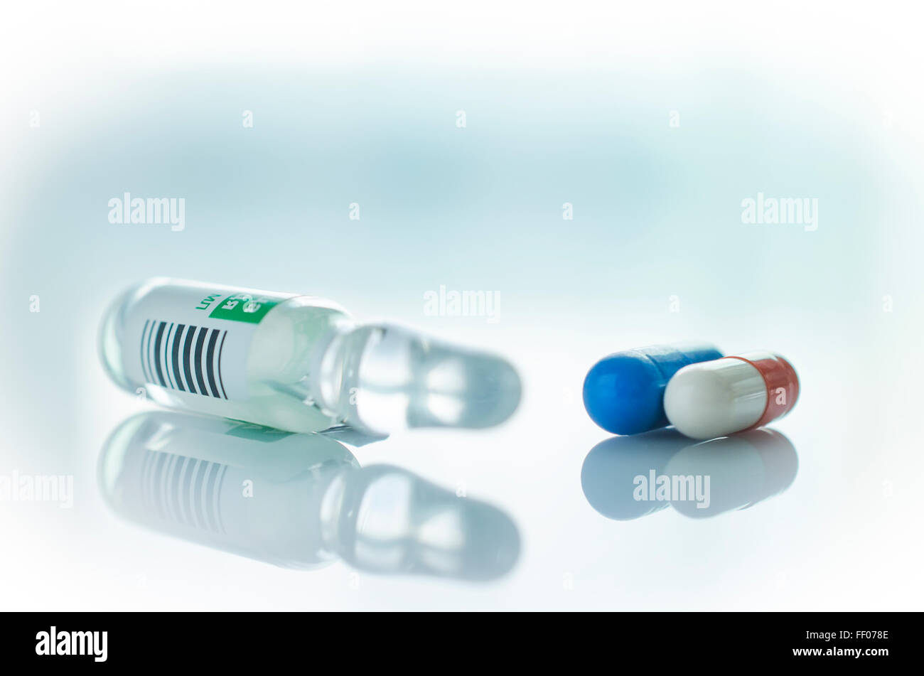 Glass vials and tablets Stock Photo - Alamy