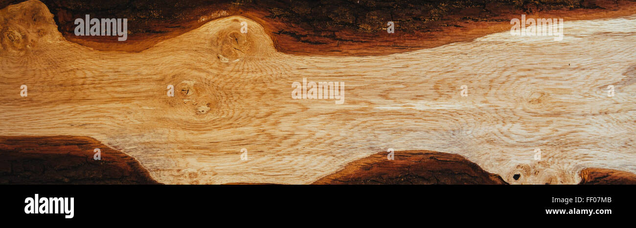 A detailed wood grain texture, highlighting the natural patterns of ...