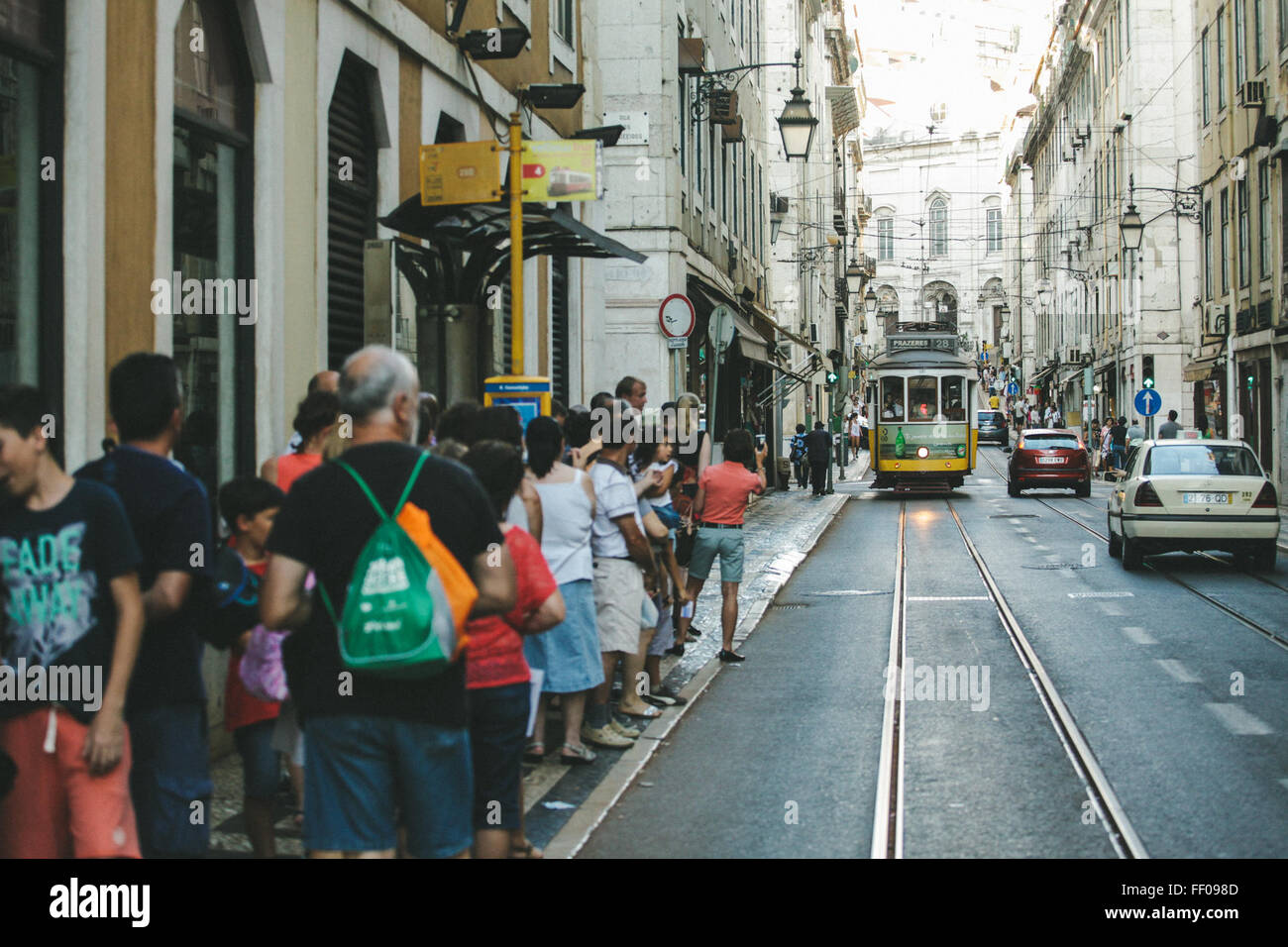 Crowd Waiting on Tram Crowd Waiting on Tram Stock Photo - Alamy