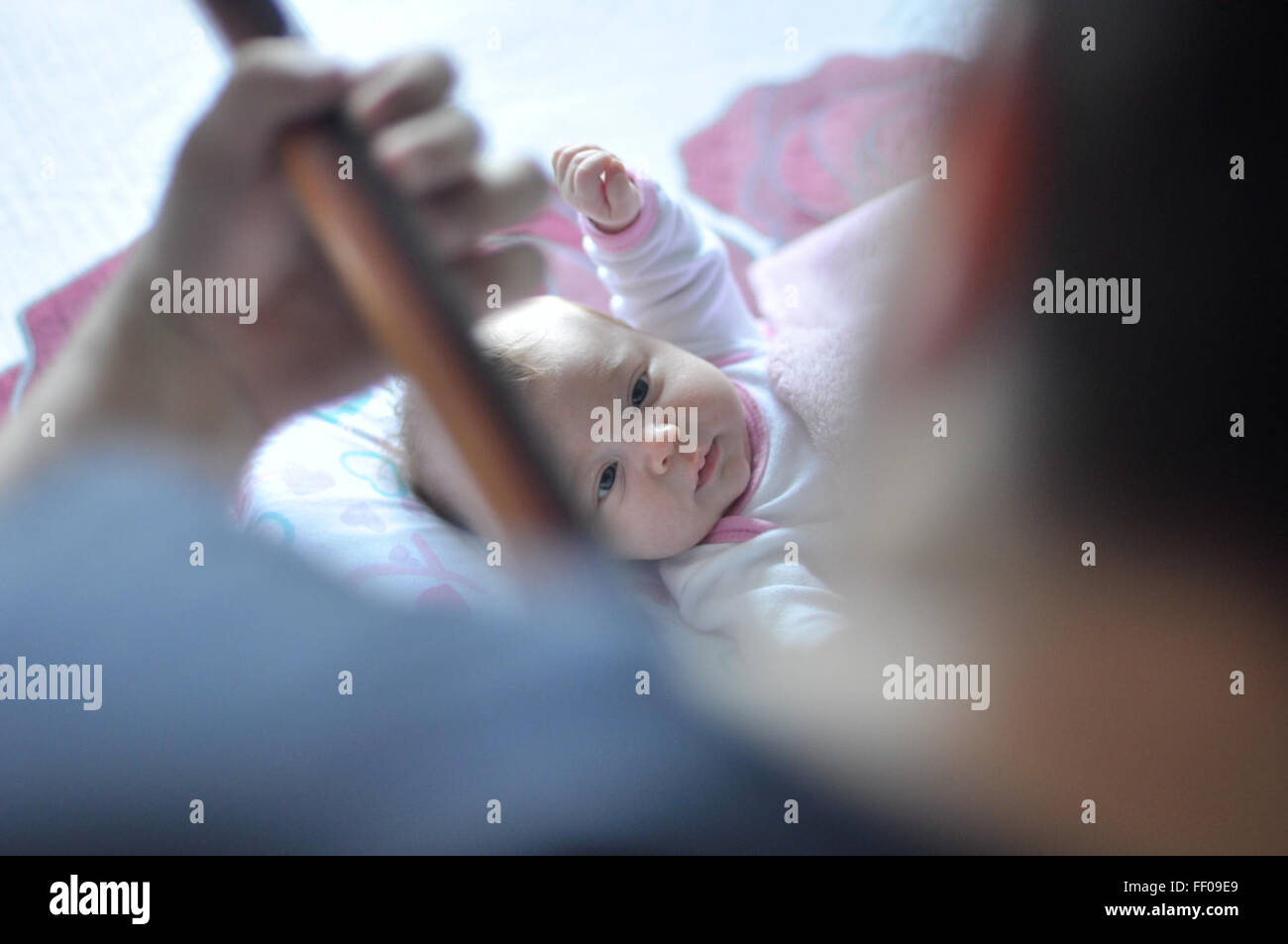 A portrait of an inquisitive infant, capturing the curiosity and wonder ...