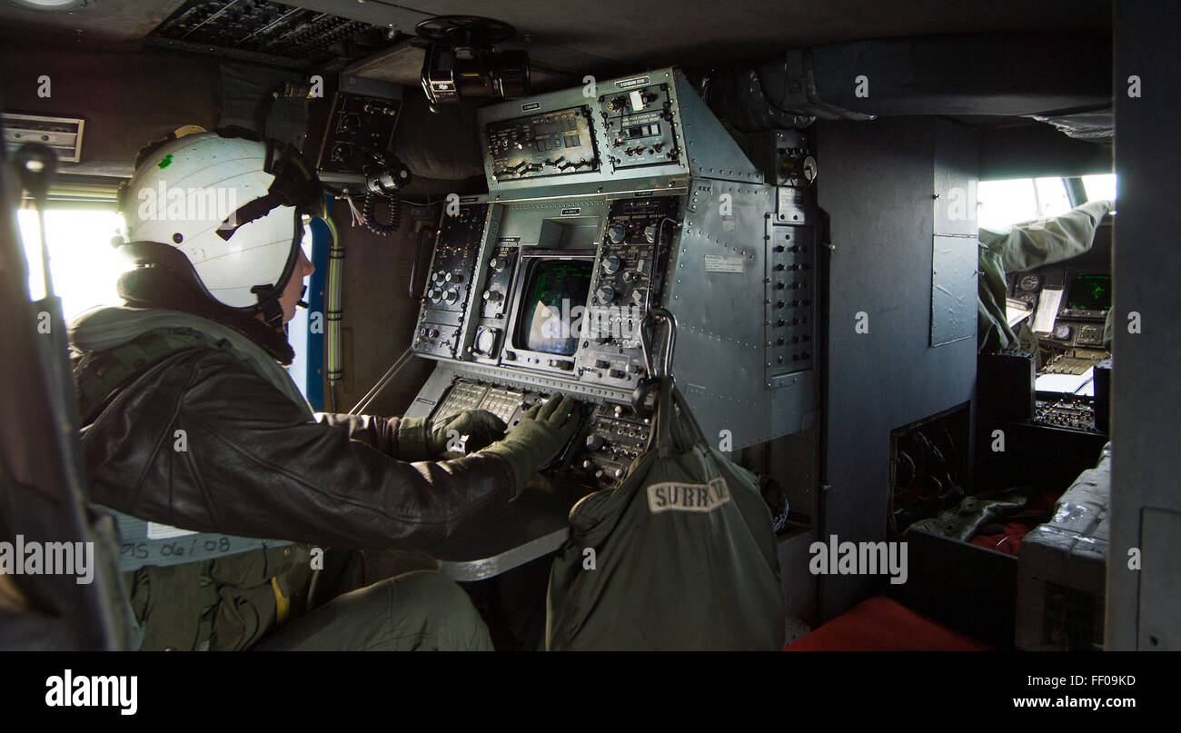 US Navy helicopter aircrewman in the rear cabin of a Seahawk Stock ...